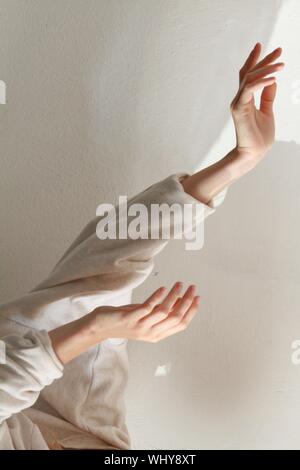 Calming movement of female's thin soft hands Stock Photo - Alamy