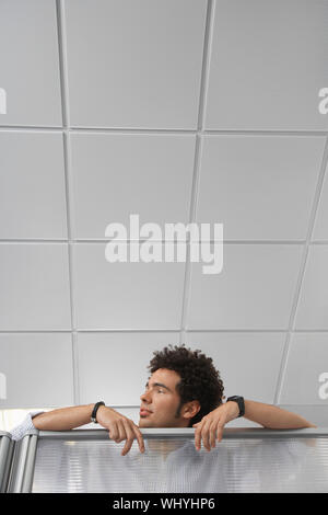 Man Peeking Over Cubicle Wall Stock Photo - Alamy