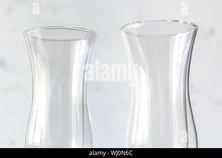 Empty double wall glasses isolated Stock Photo - Alamy