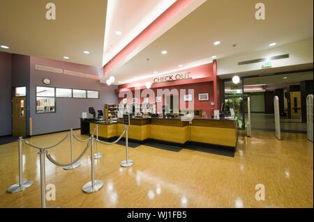 Library checkout desk Stock Photo - Alamy