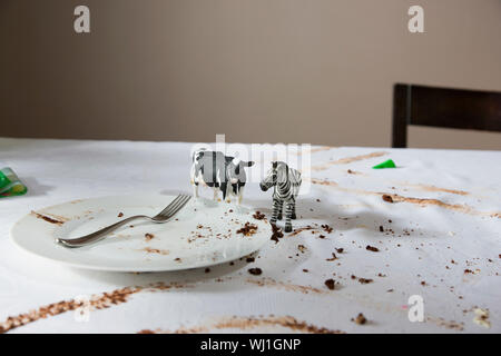 Messy dining room, table with plate and glasses after lunch Stock Photo ...