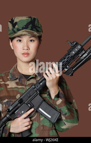 Studio portrait of confident female soldier looking sideways Stock ...