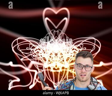 Confused computer engineer working on broken console with laptop Stock ...