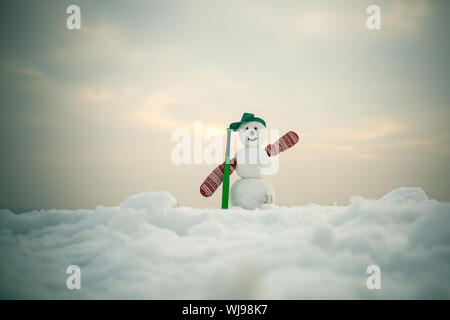 Snowman with baseball bat Stock Photo - Alamy