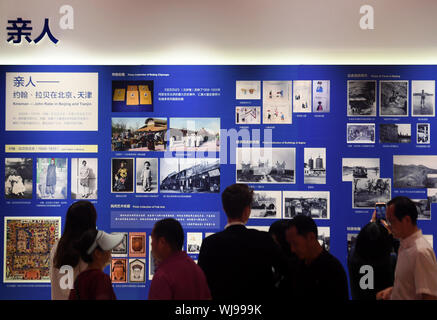 (190903) -- BEIJING, Sept. 3, 2019 -- People visit an exhibition on ...