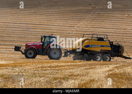 Hay Baler - farm machinery used to compress a cut and raked crop (such ...