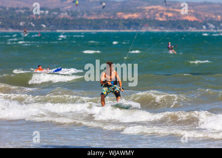 Photo athlete kitesurfing Stock Photo - Alamy