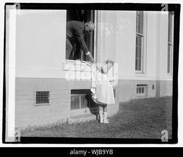A photograph of President Warren G. Harding with Sally Lefevre, taken ...