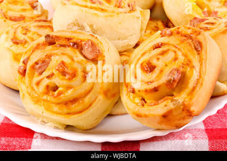 Delicious kaiser rolls with ham and cheese on wooden board Stock Photo ...