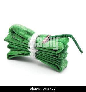 green firecracker isolated on white background showing new year concept ...