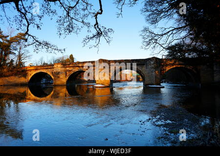 Winter light shining on Sunderland Bridge and the River Wear at ...