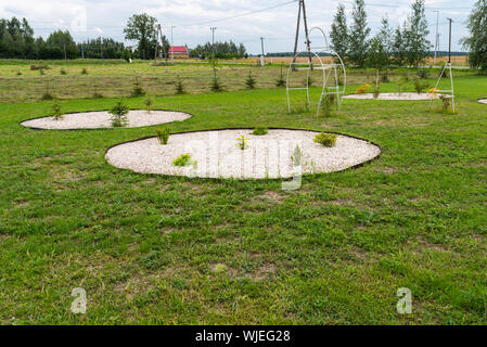 Small stone circle with planted trees in Sulby Glen, Isle of Man Stock ...