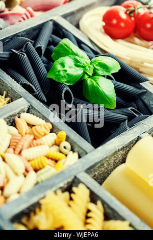 Assorted pastas in wooden box. Italian pasta collection on rustic ...