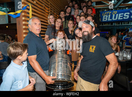 Stanley Cup Champion St. Louis Blues head coach Craig Berube hoists the ...
