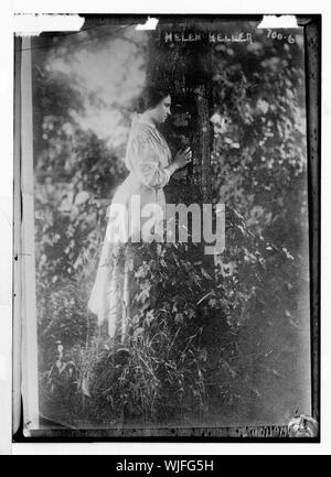 Helen Keller, standing next to tree, 1912 Stock Photo - Alamy