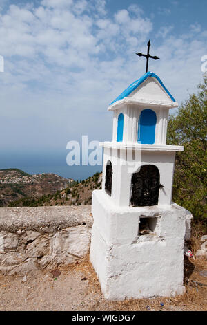 Religious Greek white memorial building near the road Stock Photo - Alamy