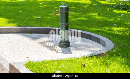 Vintage water free standpipe installed outdoors Stock Photo - Alamy