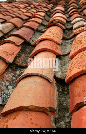 Aged old red clay arabic roof tiles, traditional architecture roofing ...