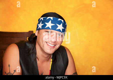 Native American man in rocking chair Stock Photo - Alamy