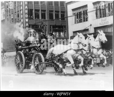 Fire engine rushing Stock Photo - Alamy
