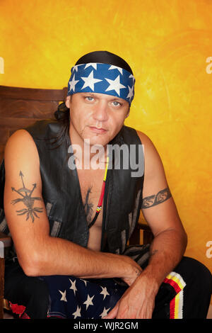 Native American man in rocking chair Stock Photo - Alamy