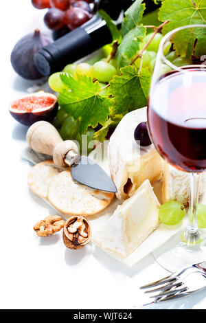 Hard cheese brick with walnut over board Stock Photo - Alamy