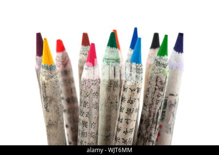 Chinese color pencils made from newspapers over white Stock Photo - Alamy
