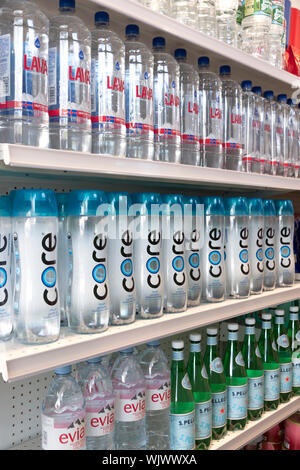 Plastic bottles of sparkling spring water on a shelf in a Lidl ...