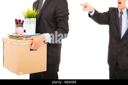 An angry boss firing a man carrying a box of personal items isolated on ...