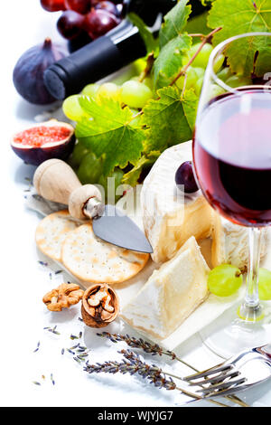 Hard cheese brick with walnut over board Stock Photo - Alamy