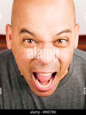 Close up shot of screaming man's face Stock Photo - Alamy