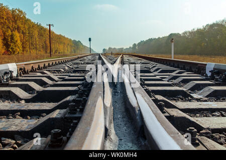 crossing of two railroads close up Stock Photo - Alamy