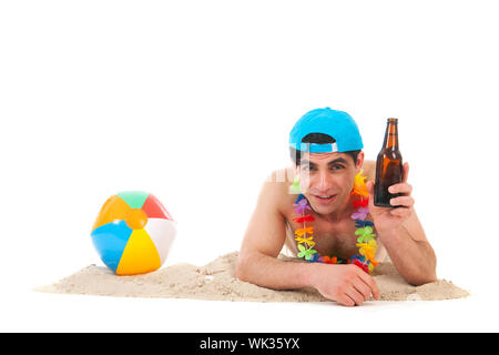 Young man laying at the beach drinking beer Stock Photo - Alamy