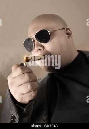 Gangster mafia man smoking cigar. Isolated on white Stock Photo - Alamy