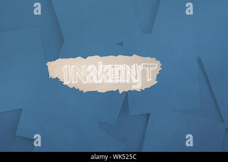 Invent against digitally generated blue paper strewn Stock Photo - Alamy