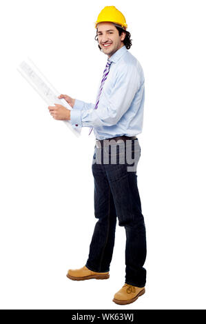 Architecture or Civil engineer analyze with construction blueprint ...