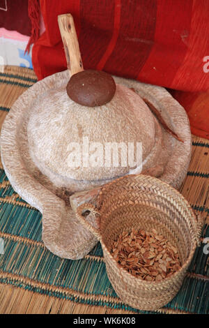 Argan oil extraction by traditional stone handmill mill Stock Photo - Alamy