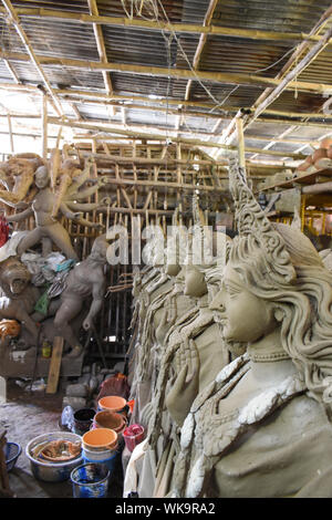 Clay idols of Durga under preparation before festival,Artist is busy to ...
