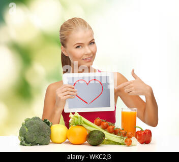 Organic food and tablet pc Stock Photo - Alamy