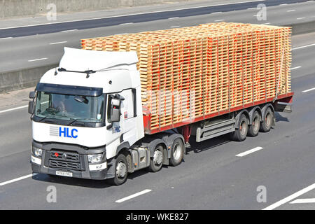 Articulated trailer loaded with timber pallets Stock Photo - Alamy