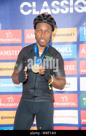 Celebrity cyclists cross the finish line on the Mall after completing ...