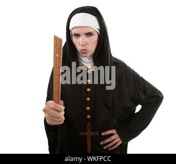 Angry Young Catholic nun pointing with a ruler Stock Photo - Alamy