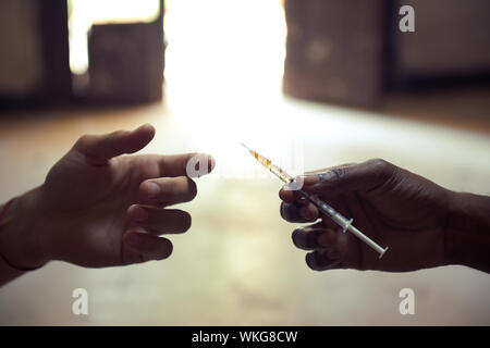 Man drugs addicted injecting heroine in his arm. Drugs concept. Disease ...