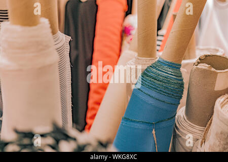 Rolls of fabrics and textiles. Sewing and fashion industry concept ...