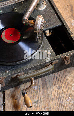 The Old dusty vinyl turntable player isolated over white background ...