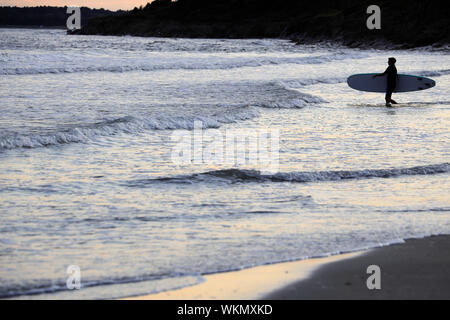 Surfers riding wave on Higgins Beach.Scarborough.Maine.USA Stock Photo ...