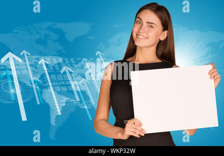 Businesswoman hold paper sheet. Graphs as backdrop Stock Photo - Alamy