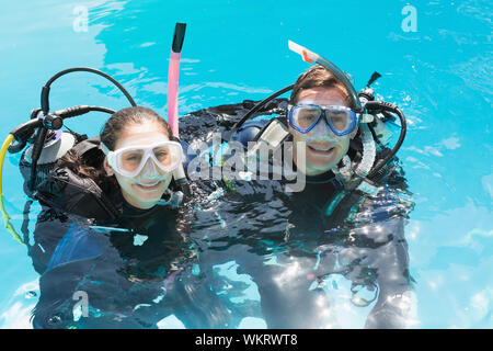 Couple practicing scuba diving together Stock Photo - Alamy