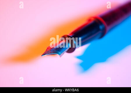 fountain penlight in color light Stock Photo - Alamy