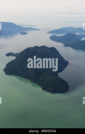 Aerial view of the Islands in Howe Sound during a vibrant sunset. Taken ...